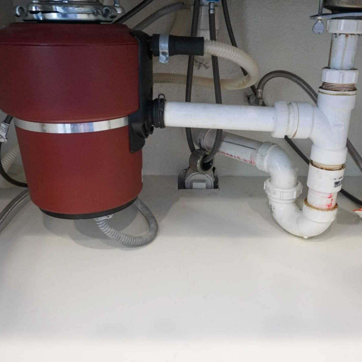 Organizing Under The Kitchen Sink - One Happy Housewife