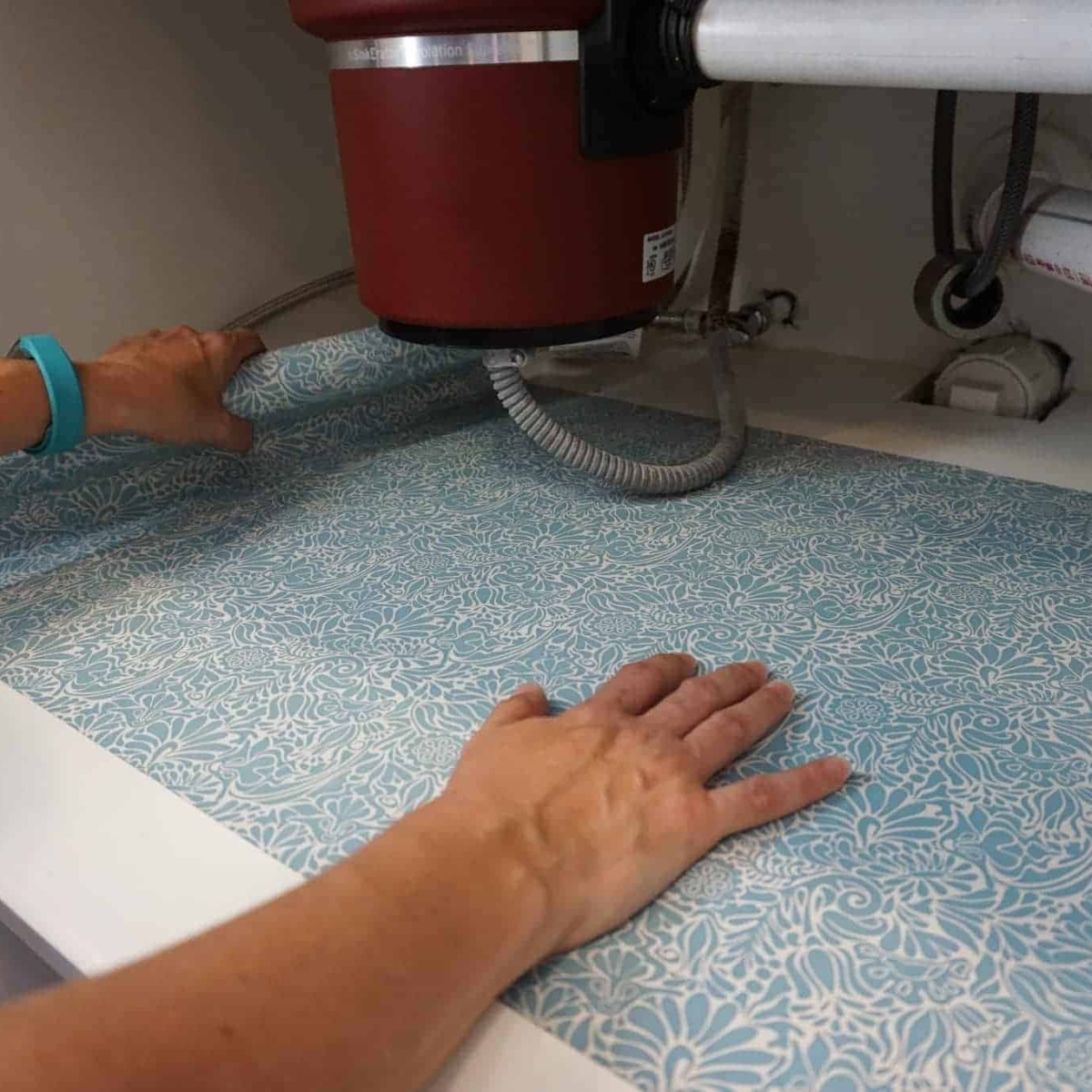 Organizing Under The Kitchen Sink - One Happy Housewife